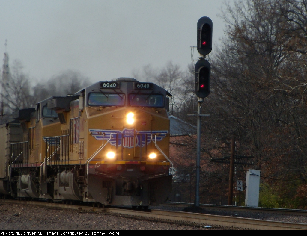 UP 6040 leads a loaded coal just east of the Kirkwood Amtrak Station